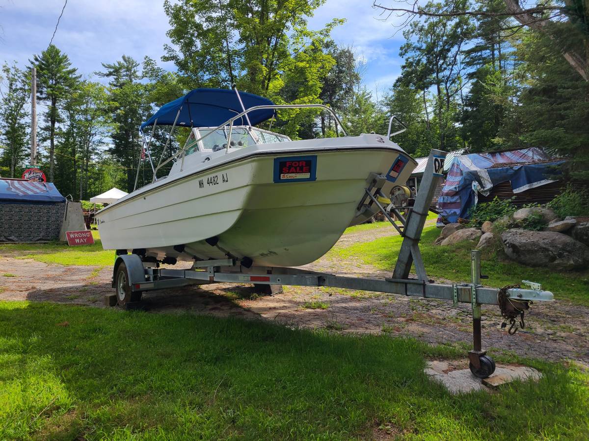 1969 Thunderbird Comanche boat with motor and trailer | Looknet